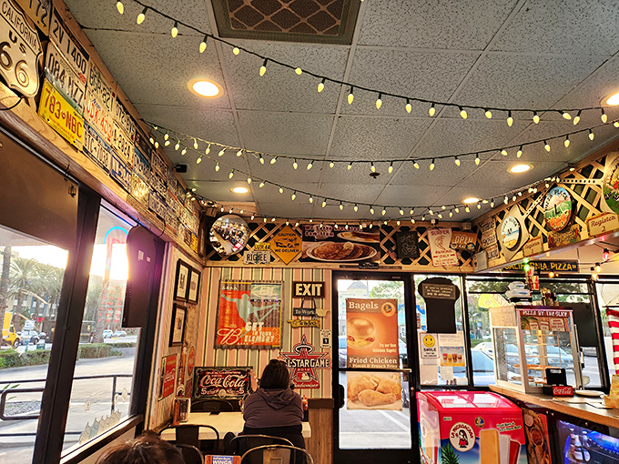 License plates and string lights create the perfect backdrop for food memories. This decor says "we've been here a while for good reason."