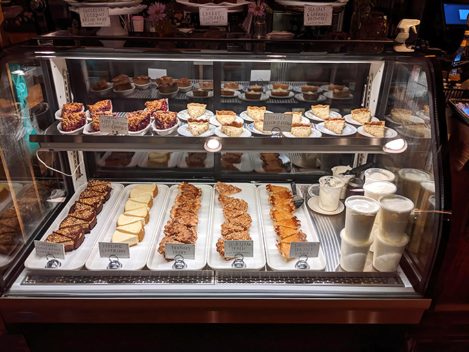 A dessert case that whispers sweet nothings and makes grown adults reconsider their dinner plans.