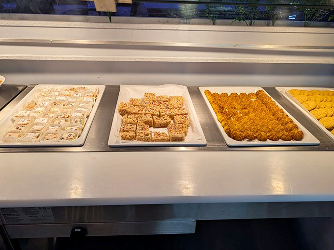The dessert section&mdash;where diet promises go to die. Those squares of sweetness are calling your name.