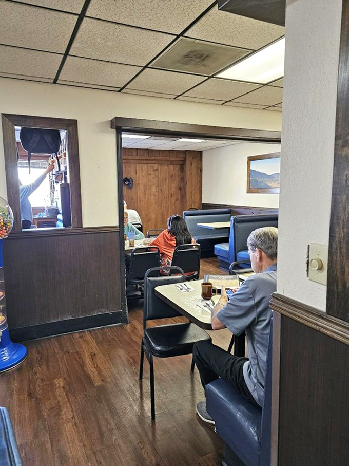 Every small-town diner needs a cozy corner where regulars can solve the world's problems over endless cups of coffee.