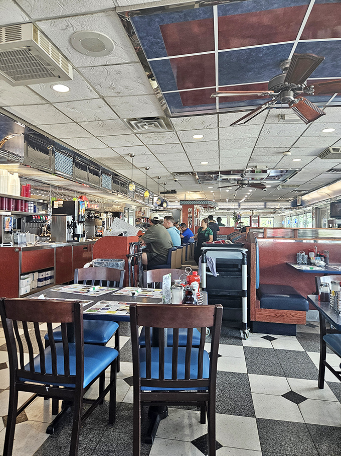 Where locals gather to solve the world's problems over bottomless coffee. The real town hall happens in these booths.