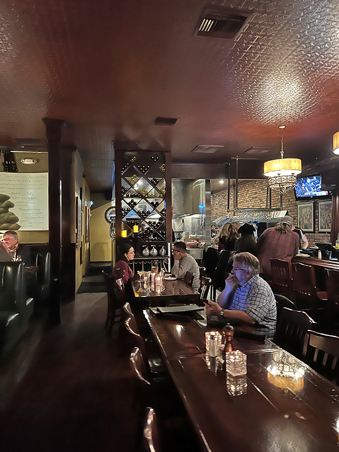 The warm glow of Nic's dining room makes everyone look like they're in on a delicious secret. Those wood tables have heard many "mmms" over the years.