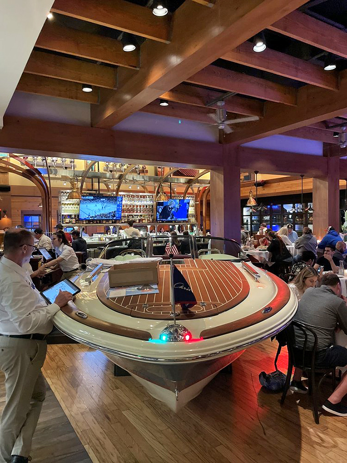 Dining among boats isn't just a theme – it's an immersion, with gleaming wood vessels becoming part of your dinner conversation.