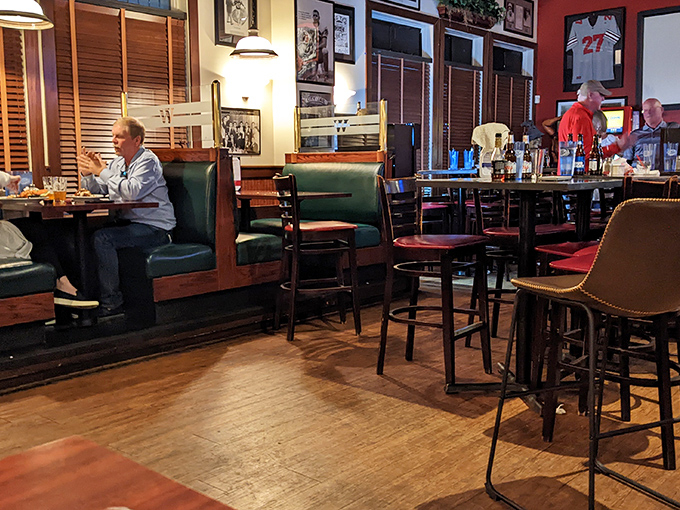 Green booth seating that's seen decades of first dates, family celebrations, and "just because it's Tuesday" dinners. 