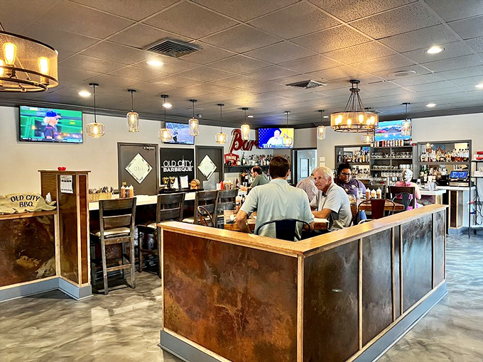 The bar area where strangers become friends over shared appreciation of smoke rings and perfectly rendered fat.