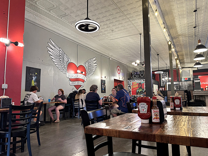The winged heart mural watches over diners like a guardian angel of good taste and satisfied appetites.