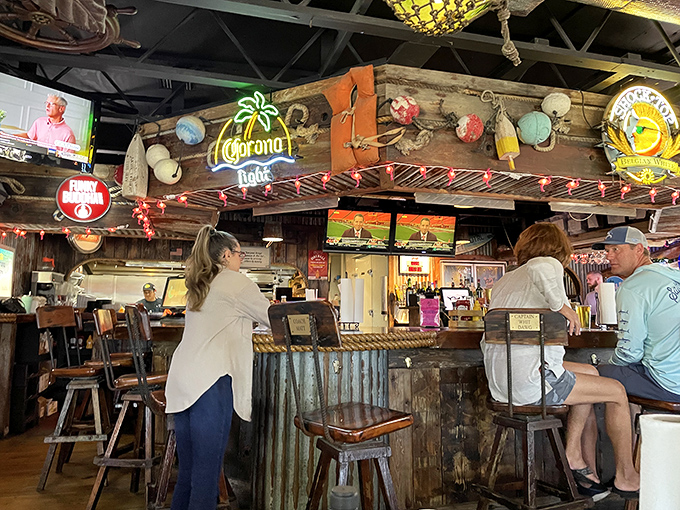 Where strangers become friends over cold beers and fishing tales. Notice the colorful buoys hanging above&mdash;each with its own seafaring story.