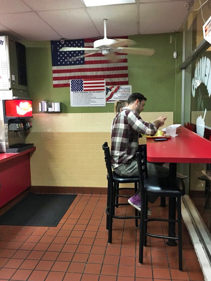 A true neighborhood spot where locals gather. Under the watchful eye of Old Glory, diners focus on the serious business of burrito enjoyment.