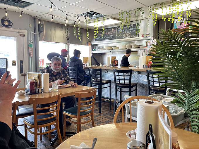 A dining room where strangers become neighbors and calories don't count if you're having a good conversation.