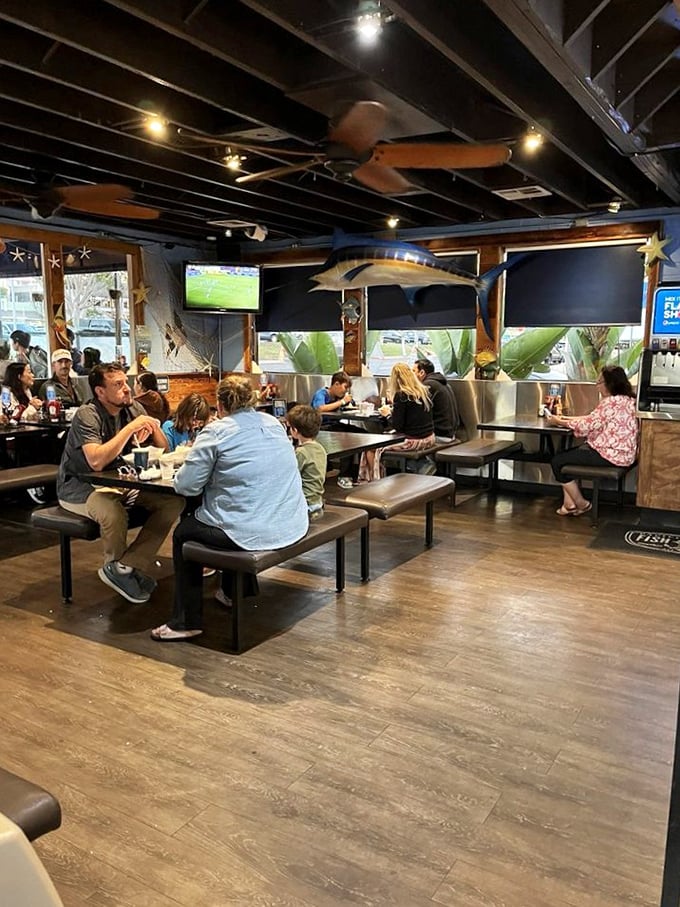 The communal tables aren't just for eating; they're for sharing stories, making friends, and plotting your next seafood adventure.