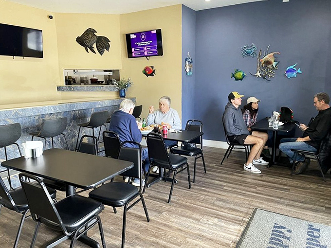 A glimpse of happy diners experiencing what vacation commercials promise but rarely deliver&mdash;authentic Florida seafood moments without the tourist price tag.