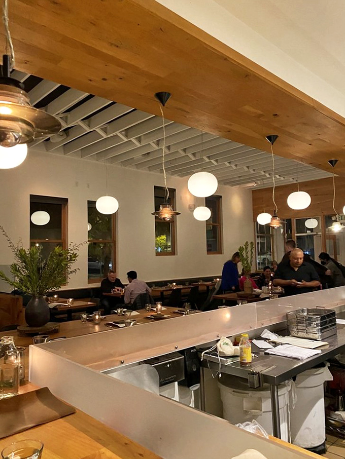 Evening at Piccino brings a warm glow to conversations and shared meals. The kind of lighting that makes everyone look like they're in a movie.