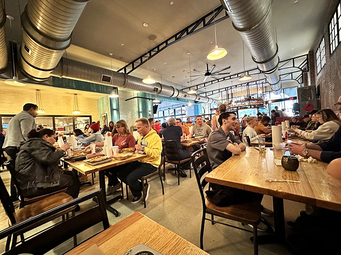 A dining room humming with the universal language of satisfied eaters. Notice the lack of conversation&mdash;everyone's too busy enjoying their food.