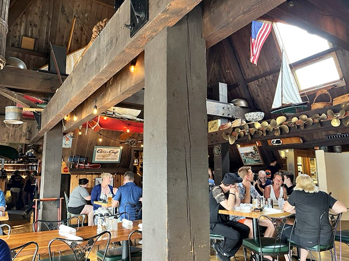 The bustling dining room hums with conversation and clinking glasses&mdash;proof that good food brings strangers together under rustic beams and string lights.