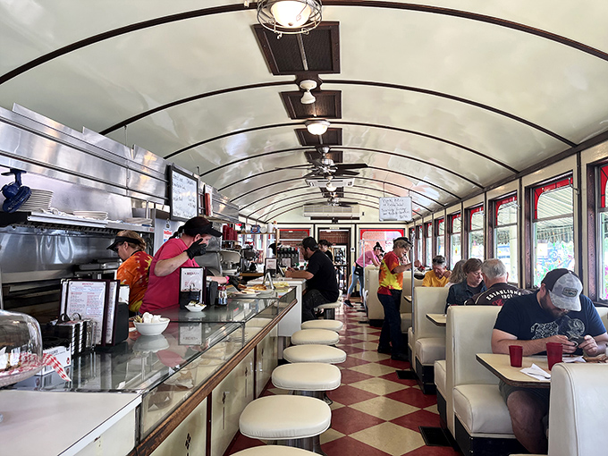 A full house is the best review. The curved ceiling creates not just architectural interest but a shared space where strangers become neighbors over pie and coffee.