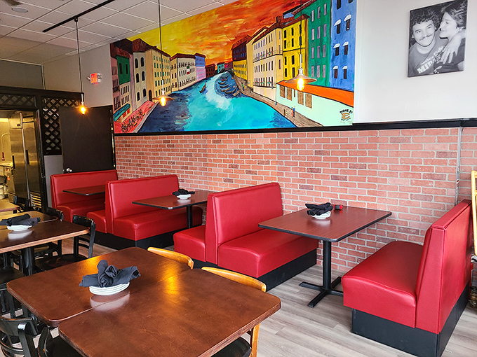The vibrant dining room mural transports you to Venice while you savor authentic Italian flavors in Ohio.