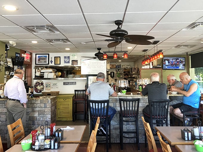 The counter seats are where the real Orlando stories unfold &ndash; business deals, retirement plans, and debates about last night's game.