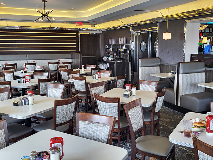 Tables waiting for the next round of hungry patrons, each one a potential stage for memorable conversations and comfort food revelations.