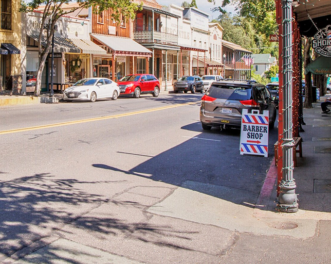 The classic barber pole signals a proper haircut awaits, in a town where "trendy" means timeless rather than temporary. 