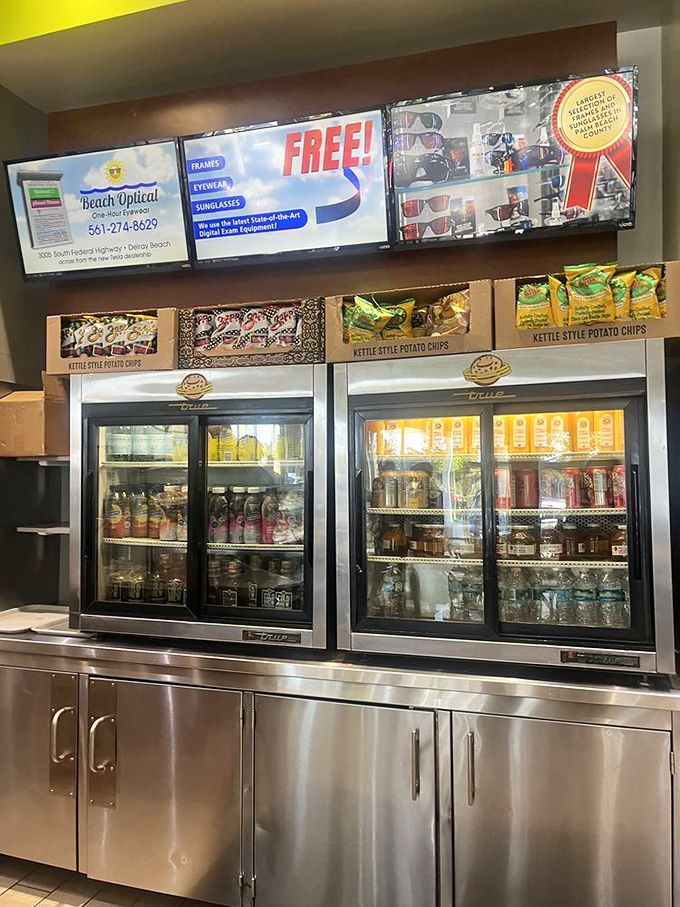 Thirst quenchers line up for duty. The well-stocked beverage coolers ensure your perfect bagel pairing is just a reach away.