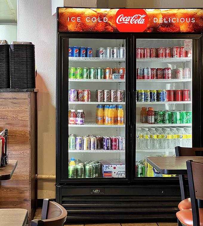 The drink cooler stands ready to extinguish the pleasant fire of perfectly spiced barbecue. Choose your firefighting beverage wisely, friends.