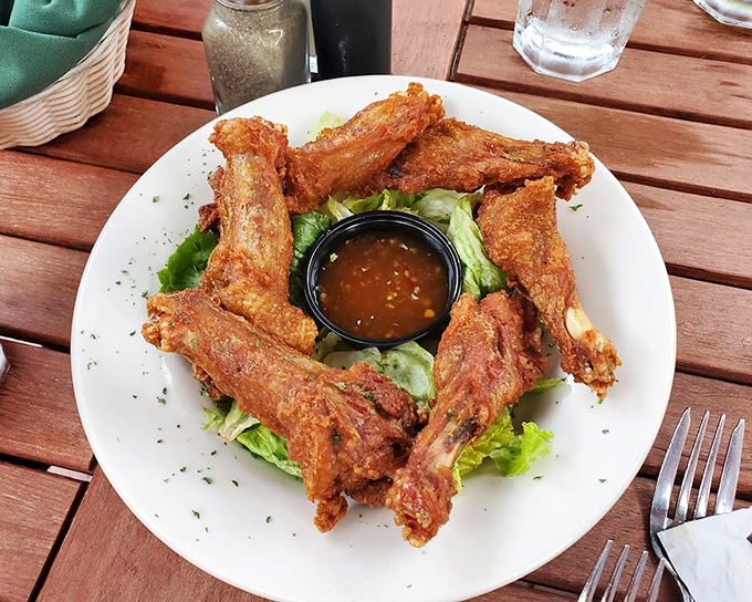 These wings aren't just fried &ndash; they're transformed. Arranged in a circle like they're performing some ancient ritual dedicated to crispiness.