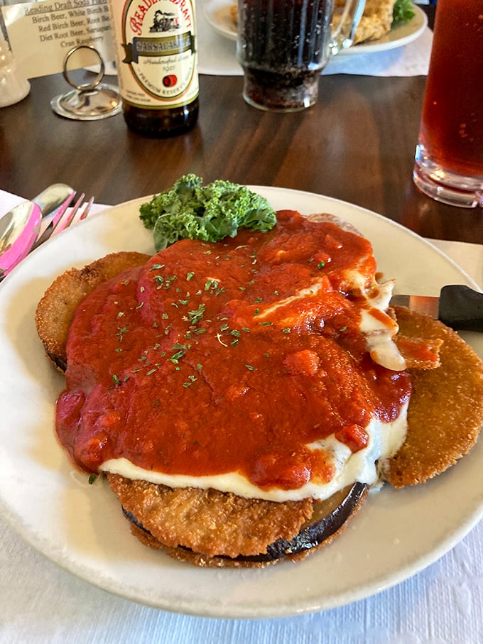 Eggplant parmesan that doesn't hide behind pretension &ndash; just layers of crispy, saucy, cheesy goodness that would make any Italian grandmother nod in approval.