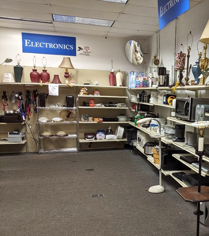 The electronics corner: where yesterday's gadgets await tomorrow's tinkerers. That brass lamp could be the statement piece your living room needs.