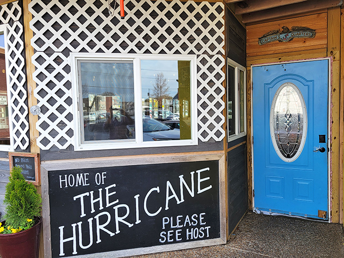 The blue door that opens to seafood heaven - your portal to Virginia Beach's most delicious hidden treasure.