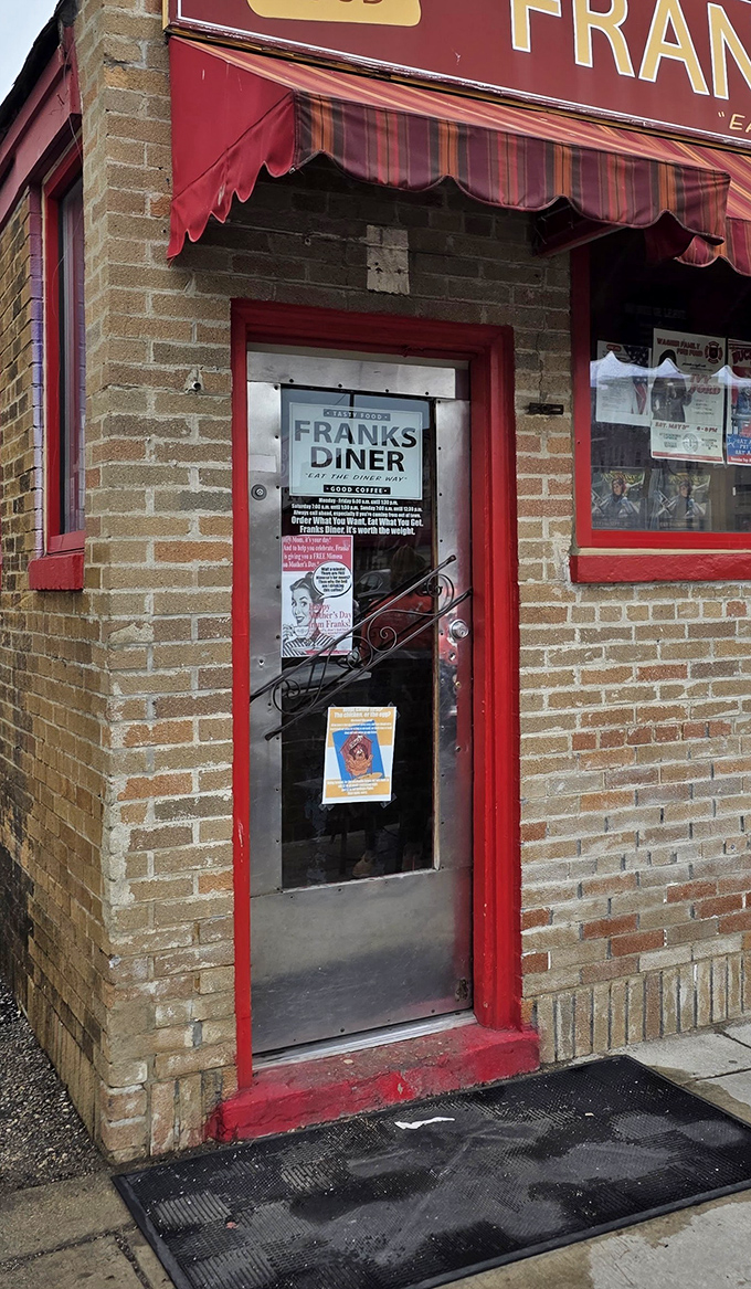 The entrance promises simple pleasures within. That red door might as well be a portal to breakfast nirvana.
