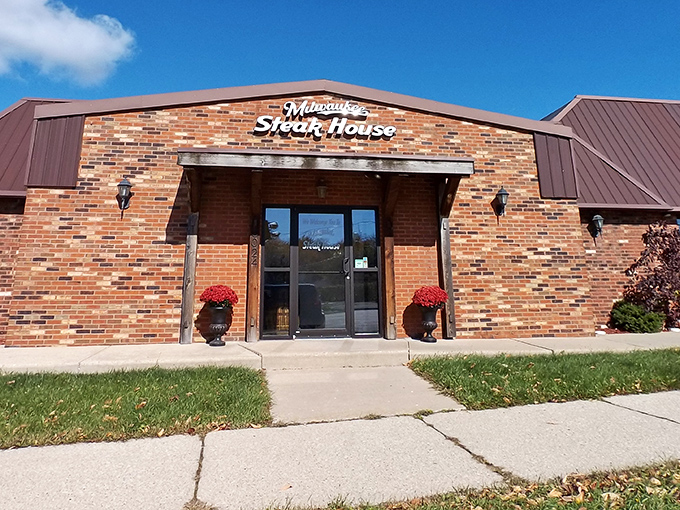 The entrance promises no gimmicks, just honest-to-goodness steakhouse excellence. Those planters aren't just decorative&mdash;they're a commitment to hospitality.
