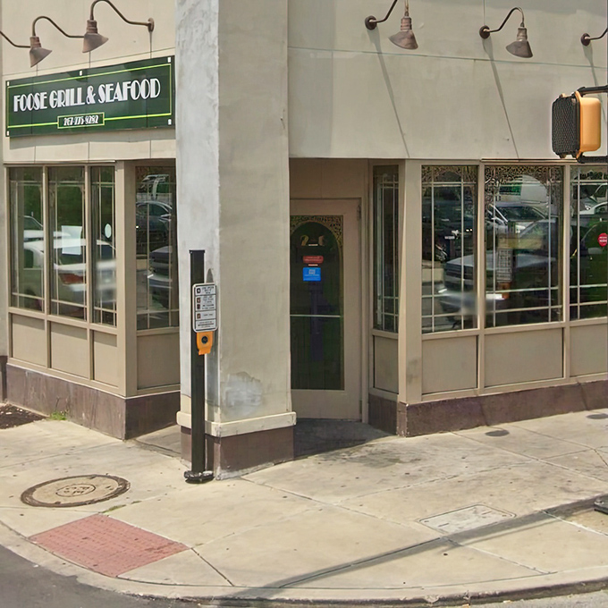 The corner entrance that serves as a portal to seafood nirvana. Those vintage lamps aren't just for show—they're beacons guiding hungry travelers to their destination.