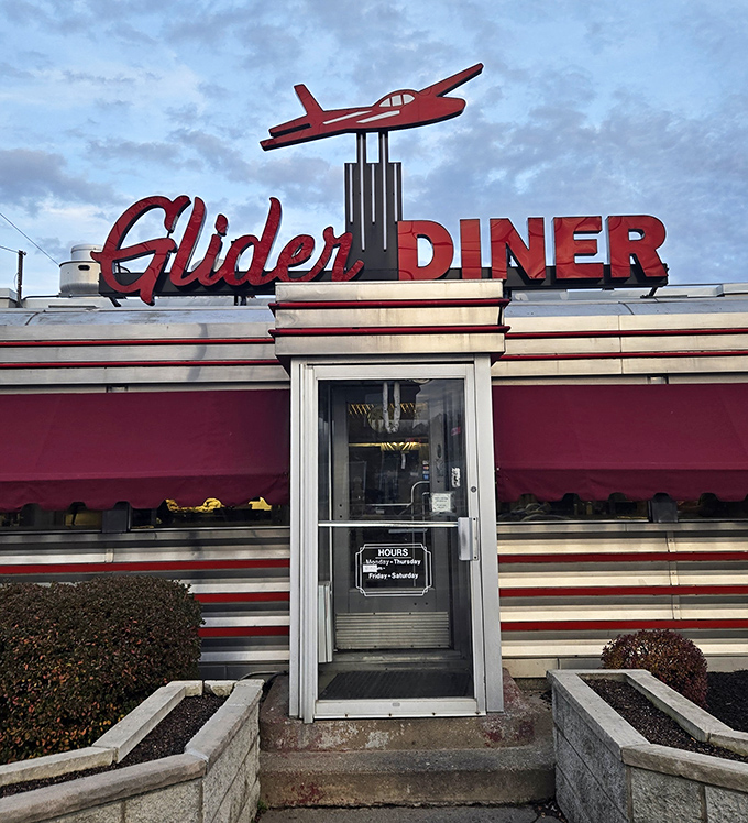The entrance at dusk, when that neon sign becomes a lighthouse guiding hungry souls to port. Some architectural details simply can't be improved upon.