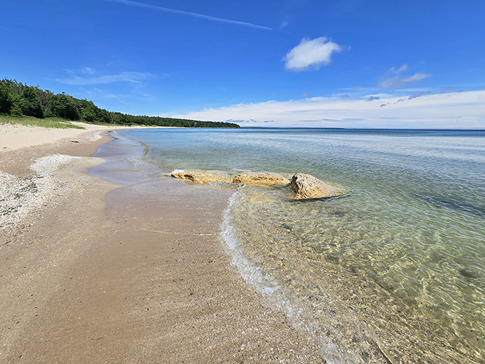 The kind of beach that makes you want to cancel all your appointments for the week. Pristine waters whispering, "Stay awhile."