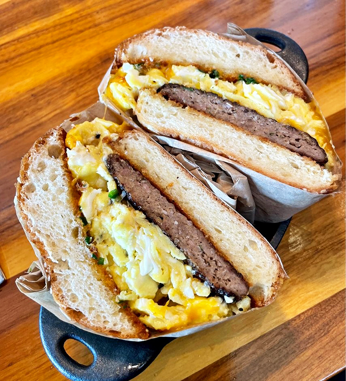 Breakfast sandwich perfection: the ideal ratio of egg to sausage to bread. The kind of portable meal that makes you want to invent errands.