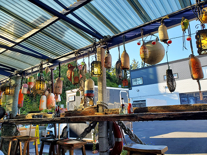 Fishing floats transformed into hanging art&mdash;proving that in Newport, even the decorations have had careers at sea before retiring to restaurant life.