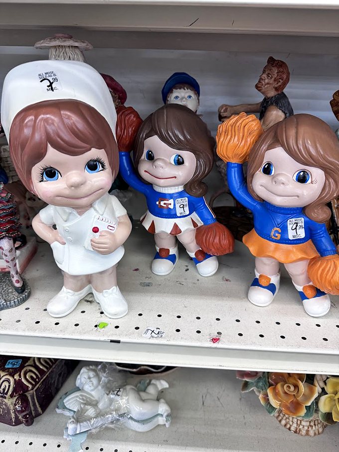 The figurine squad stands at attention, their wide-eyed optimism unchanged since the 1970s. Someone's collection becomes another's nostalgic find.
