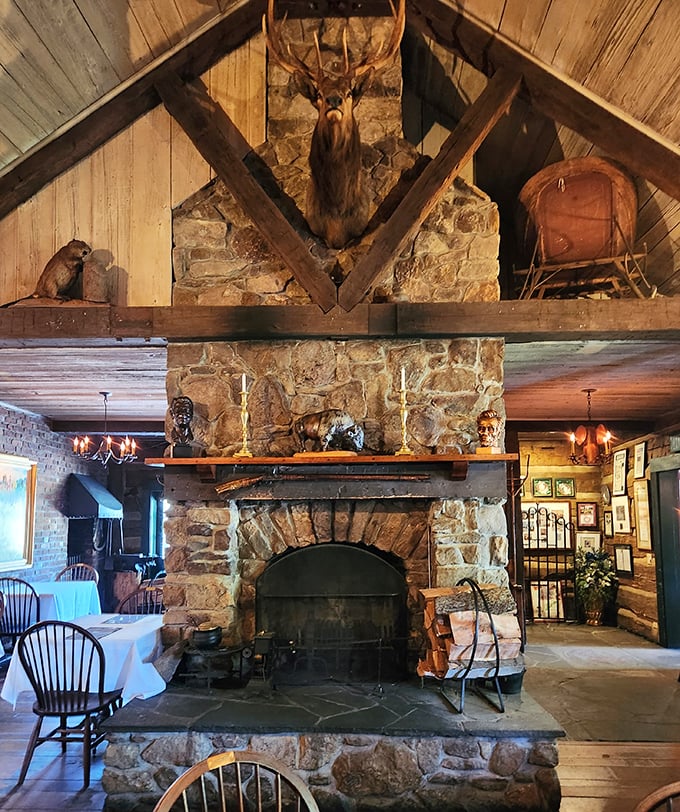 A fireplace so magnificent it deserves its own zip code. Stone, timber, and taxidermy create the ultimate rustic gathering place.