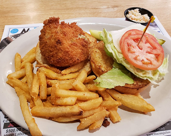 This isn't just fried fish &ndash; it's a testament to the simple pleasure of a perfectly crisp exterior giving way to flaky white fish beneath.