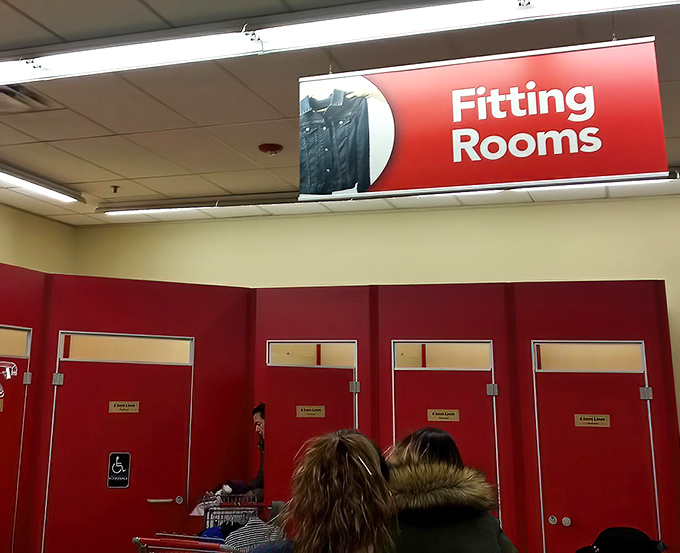 The fitting room corridor &ndash; that sacred space where fashion dreams either soar or crash against the harsh reality of fluorescent lighting.