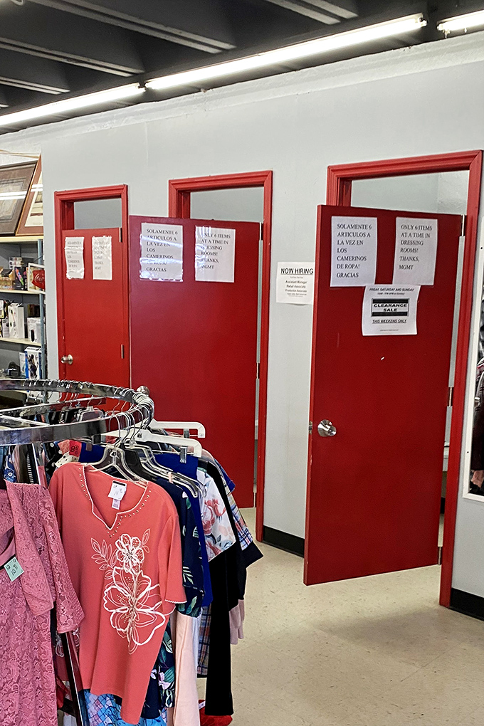 The fitting rooms await your fashion experiments. Those red doors have witnessed countless transformation moments when secondhand becomes second chance.