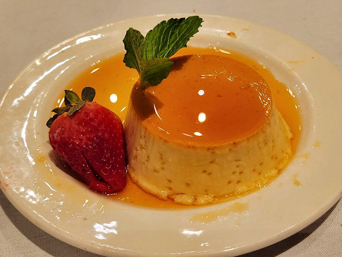 Flan that jiggles with just the right amount of confidence, surrounded by a caramel moat you'll want to swim in despite obvious logistical challenges.