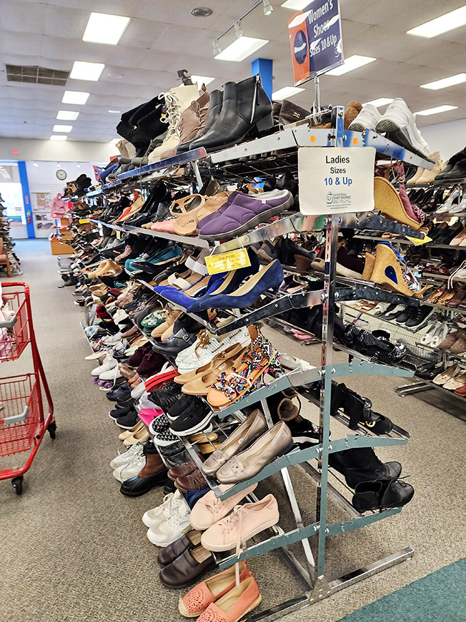 Shoe heaven stretches as far as the eye can see. From practical flats to statement boots, these racks hold footwear waiting for their Cinderella moment.