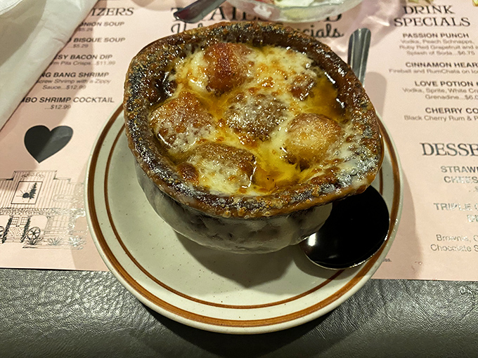 French onion soup with a golden crown of bubbling cheese&mdash;a bowl of comfort that's worth the inevitable chin dribble.