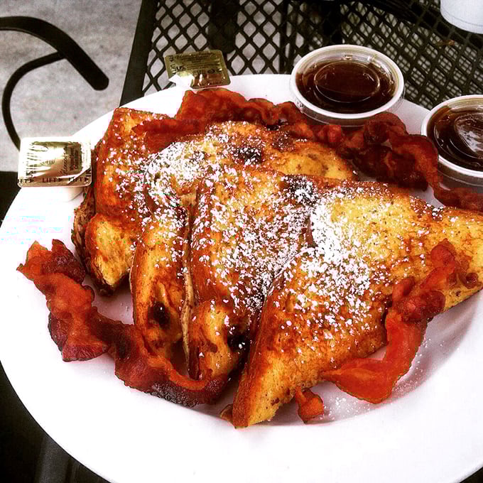 French toast that's dressed for success with powdered sugar and bacon. Breakfast or dessert? The correct answer is "yes."