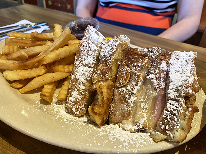 This isn't just French toast &ndash; it's a powdered sugar-dusted monument to indulgence that makes you forget you're supposed to be watching your carbs.