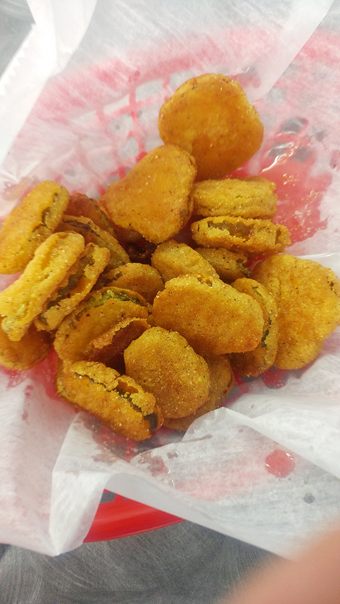 Fried pickles: Proof that anything becomes more lovable after a dip in the fryer. Tangy, crunchy bites of Southern ingenuity.
