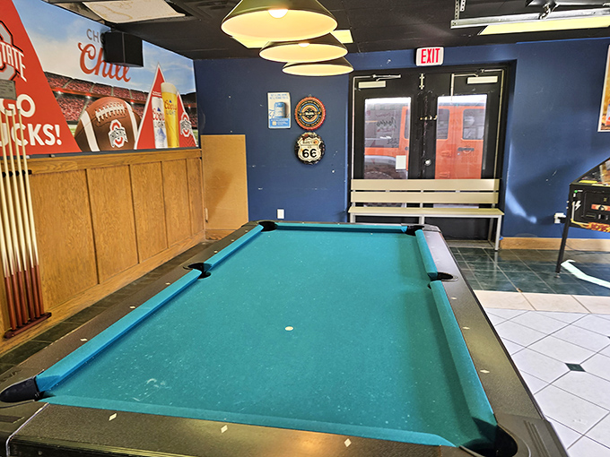 A pool table where friendly rivalries unfold while waiting for pizzas. Some of the best conversations in Columbus happen right here.