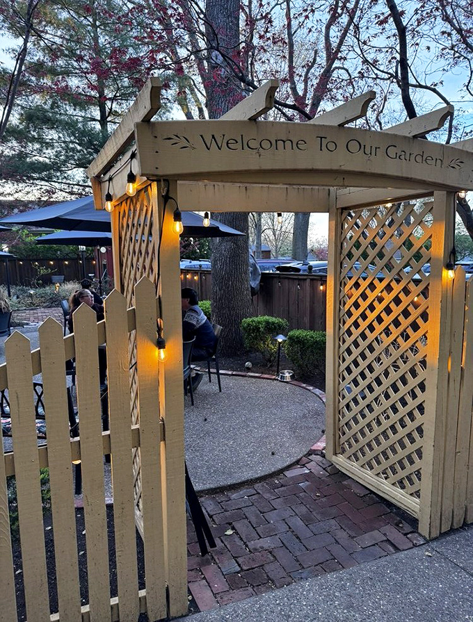 "Welcome To Our Garden" isn't just a sign, it's an invitation to dine under open skies in a space that feels magically removed from everyday life.