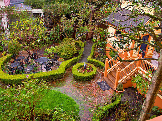 The Gingerbread Mansion Inn's garden is a geometric wonderland of manicured hedges and secret sitting areas. Victorian relaxation perfected.